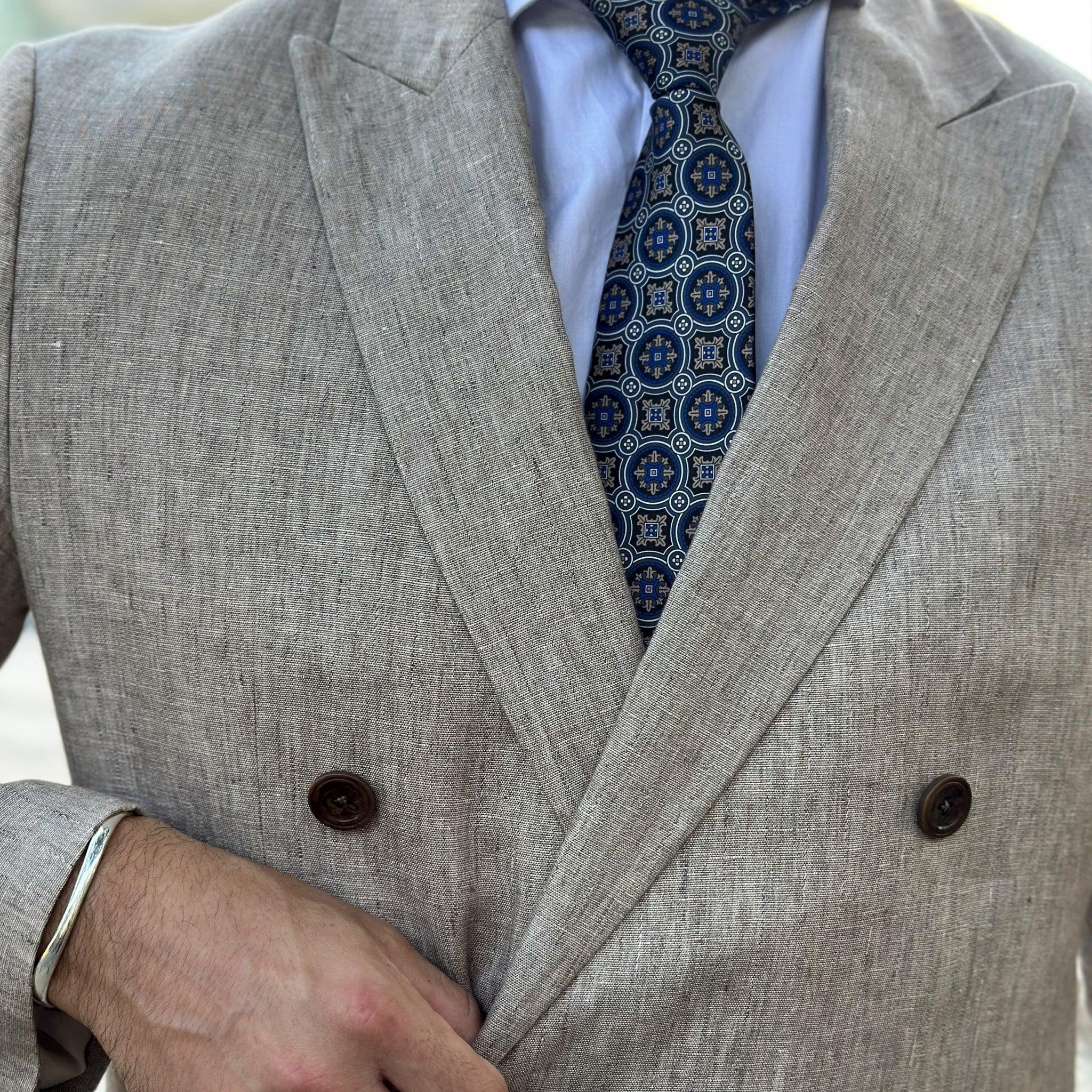 Qué color de corbata usar con un traje gris – Barlovento de Biar